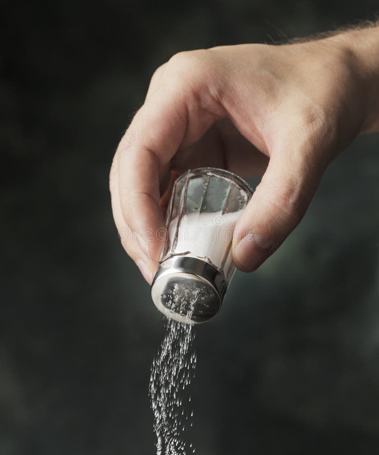 More salt stock image. Image of salty, hand, food, adding - 11257887