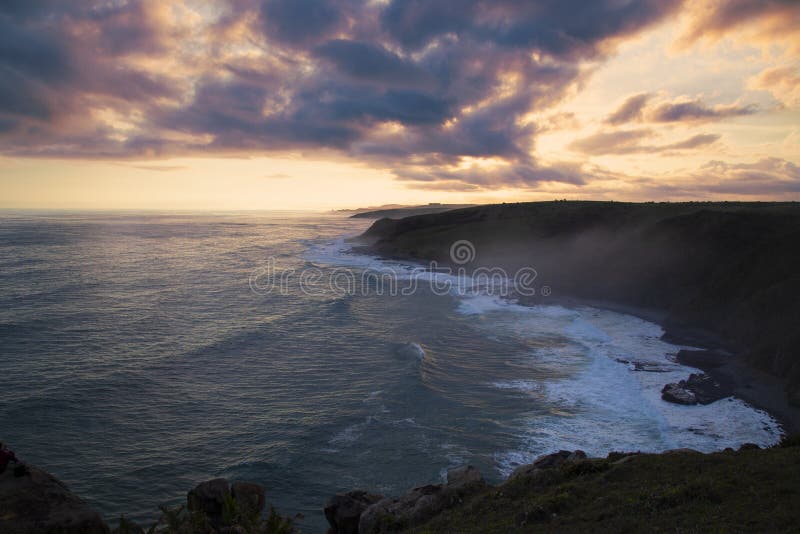 Morgan Bay Cliffs at Sunset Stock Image - Image of landscape, lake ...