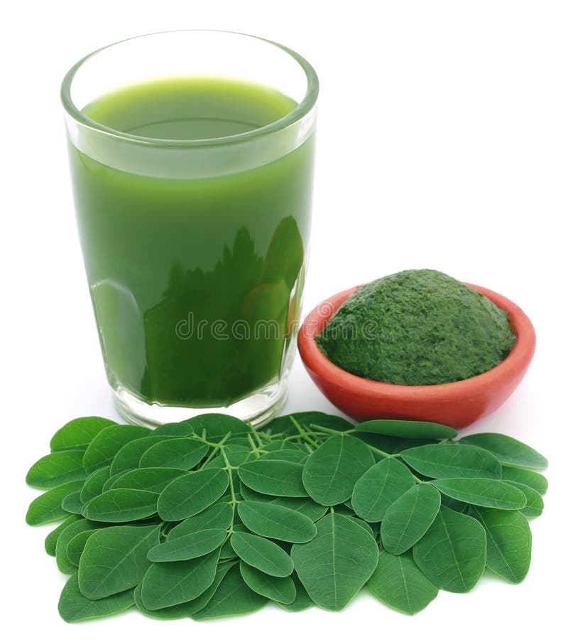Moringa Leaves with Extract in a Glass Stock Image - Image of mashed ...