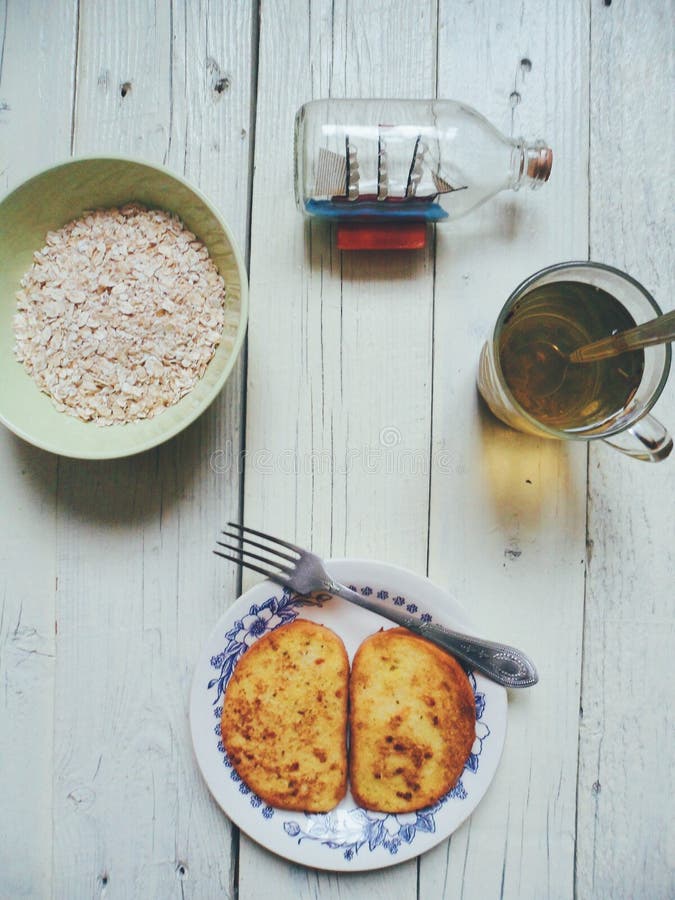 Morning Breakfast of Oatmeal, Toast and Green Tea Stock Photo - Image ...