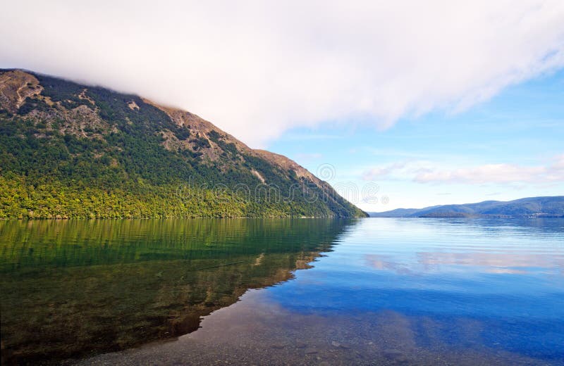 Morning Clouds and Reflections on a Mountain Lake Stock Image - Image ...