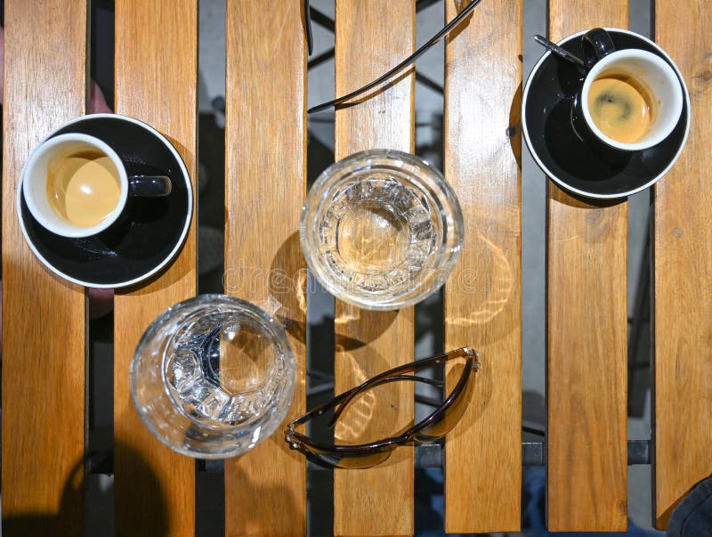Morning Coffee and Refreshment on a Wooden Table in a Cozy Cafe Setting ...