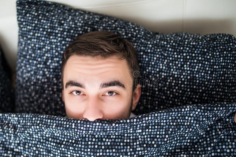 Morning Concept. Man Under Covering in Bed at Home Stock Image - Image ...