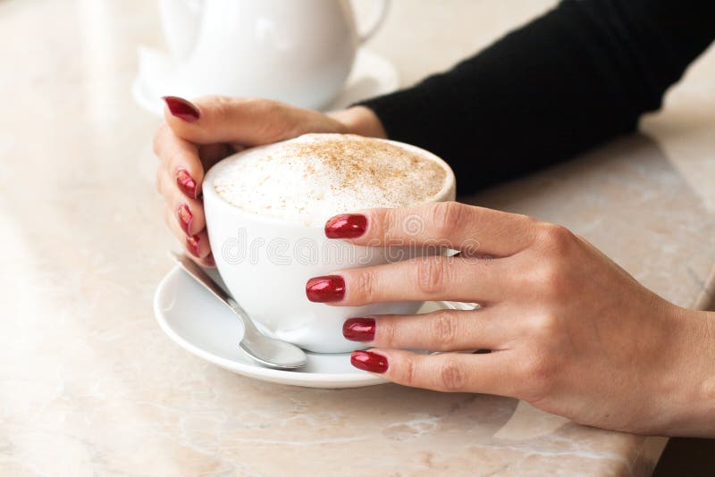 Morning Cup of Cappuccino and Hand of a Girl with Stock Image - Image ...