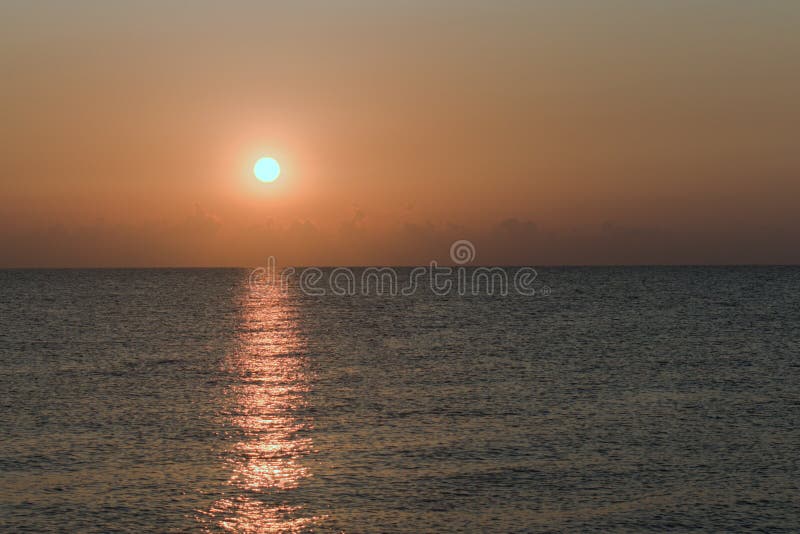 Rising Sun with Reflection in Ocean Water at Kalapathar Beach, Havelock ...