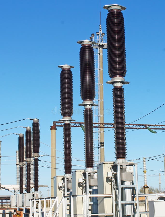 High Voltage Transformers in an Electrical Substation. Side View ...