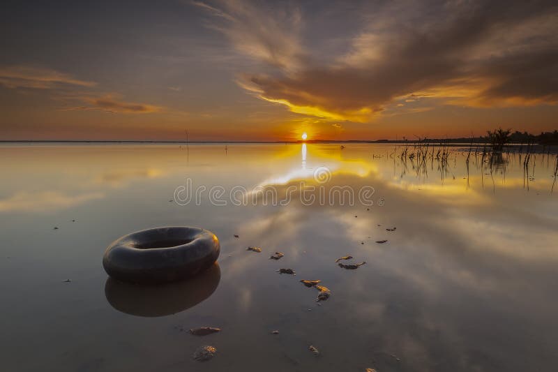 Morning Float with Reflection during Summer Sunrise at Terengganu Beach ...