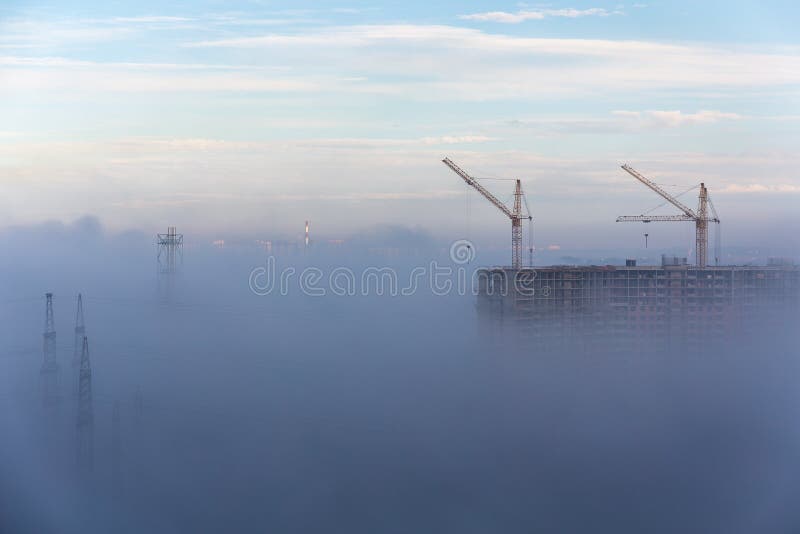 Construction site in fog stock image. Image of development - 117074441