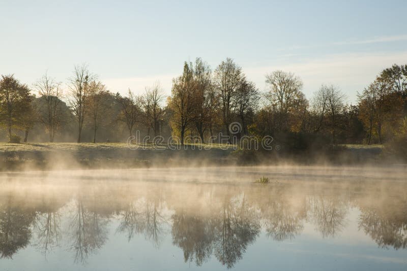 Morning fog over water stock image. Image of autumnal - 3385965