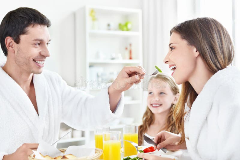 Happy Family Having Breakfast at Home Stock Image - Image of beautiful ...