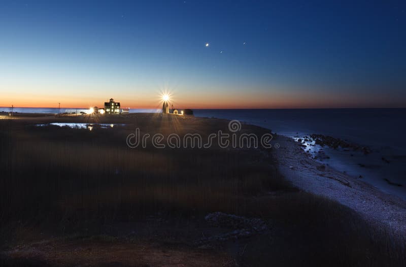 Morning at the Lighthouse stock photo. Image of sunset - 390608156