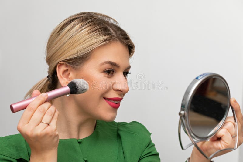 Morning makeup routine stock image. Image of hand, female - 237774007