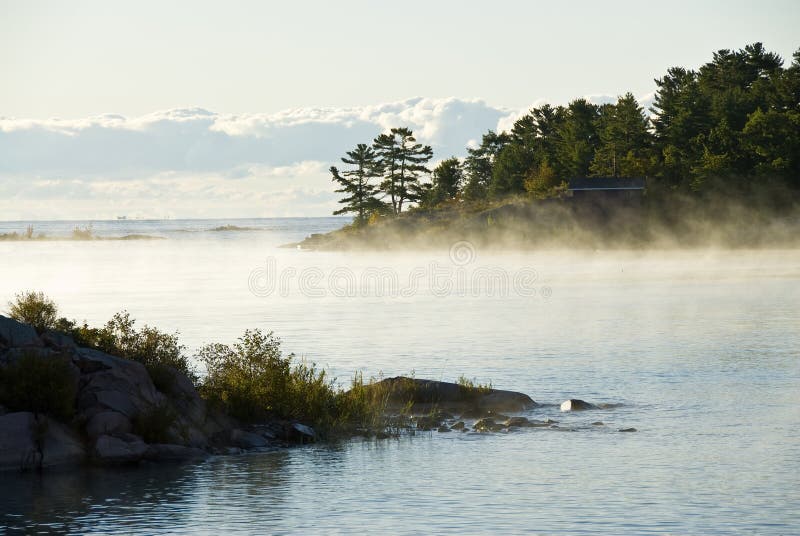 Morning Mist on the Lake stock image. Image of geological - 11076663