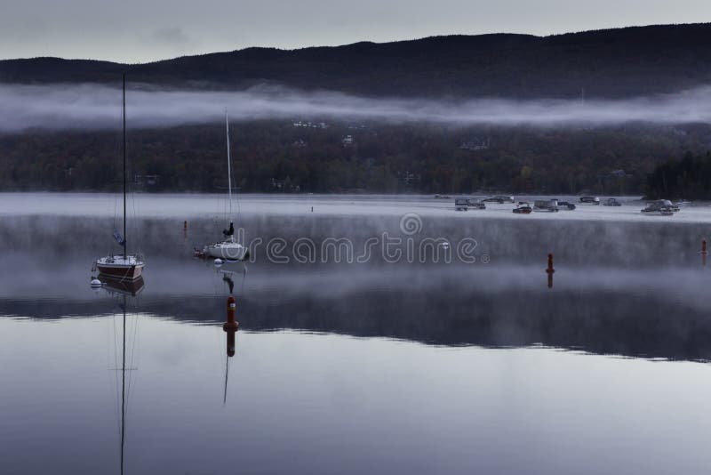 Boats in the mist stock image. Image of water, historic - 33493573