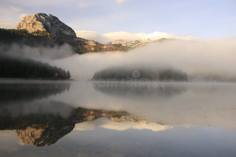 Morning Mist Over Lake and Mountains Stock Image - Image of reflected ...