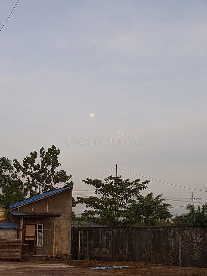 Morning moon work stock photo. Image of work, moon, morning - 264177246