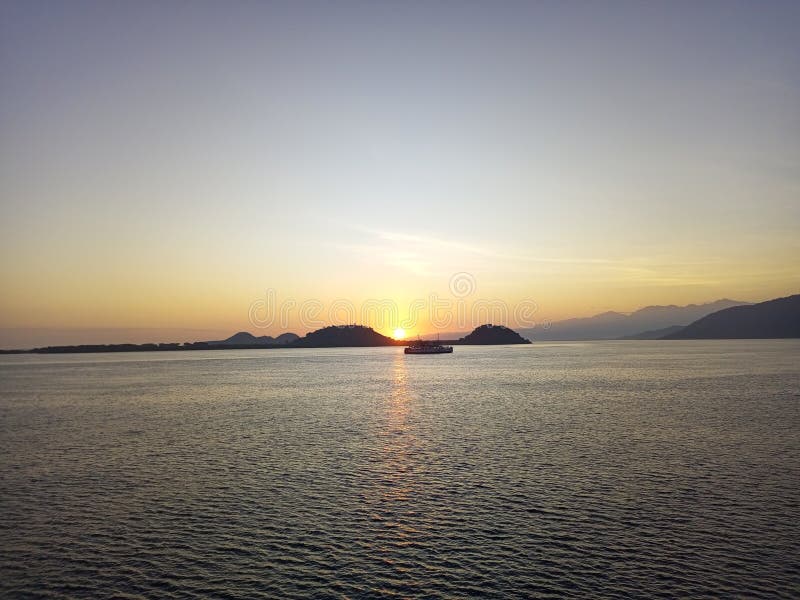 Morning Sun Appeared at the Eastern End of the Island Stock Photo ...