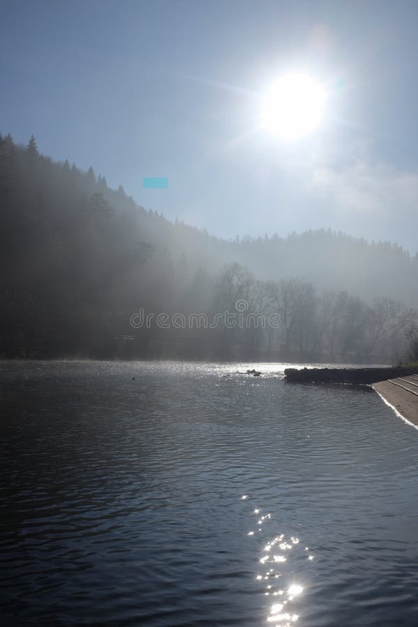 Morning Sun and Fog Hovering Over a Mountain River Stock Image - Image ...