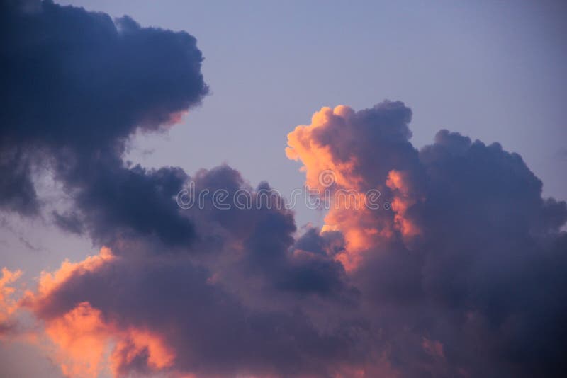 The Morning Sun Hugs the Clouds. Stock Photo - Image of colours, clouds ...
