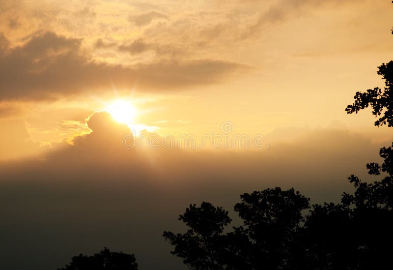 Morning Sun through Storm Clouds Stock Photo - Image of dark, beam ...