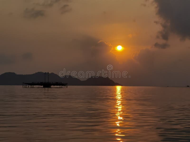 Morning Sunrise at the Sea with Black Cloud Shadow Stock Image - Image ...