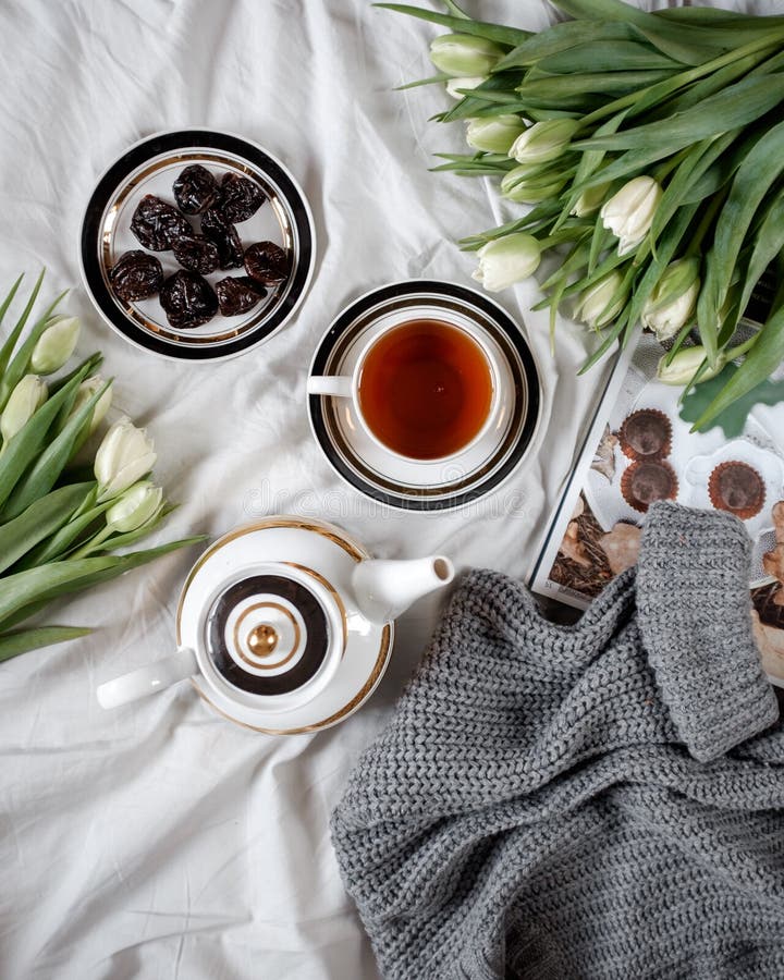 Morning with Tea and White Tulips on a Cozy Bed Stock Image - Image of ...
