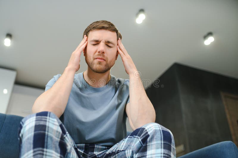 Morning of Young Man Suffering from Hangover at Home Stock Photo ...