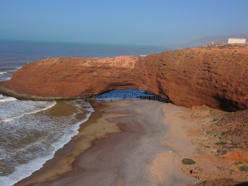 Moroccan beach with a rock stock photo. Image of cloudless - 74722544