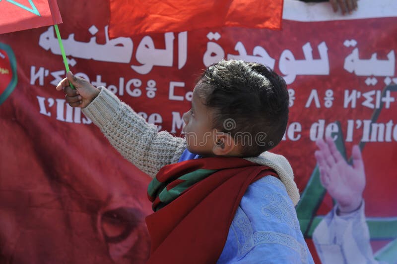 Moroccan Child with Camels editorial image. Image of tourism - 14270130