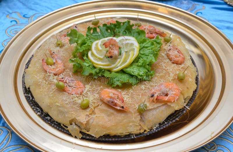 Moroccan Fish Pie Called Bastilla in Morocco, Decorated with Shrimps ...