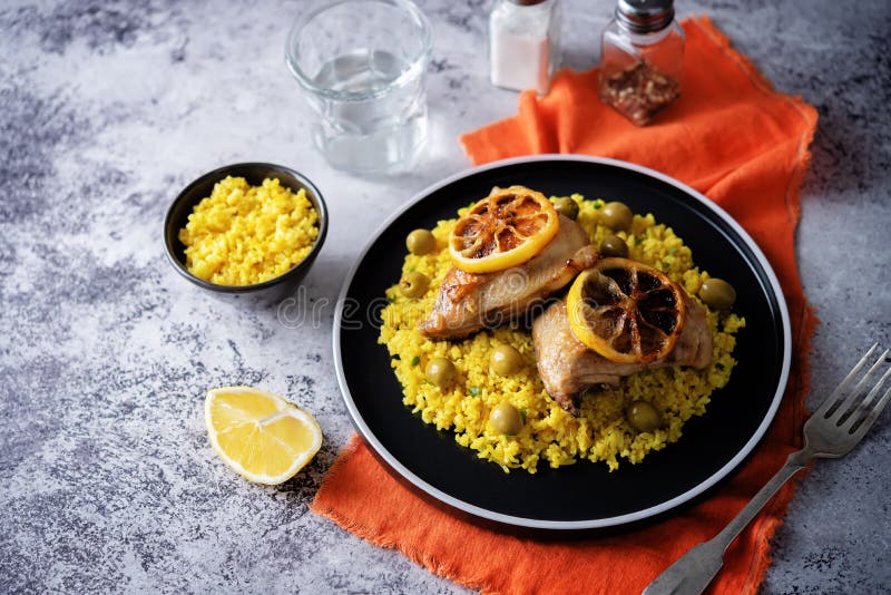 Moroccan Fried Chicken Breast with Curry Rice in a Plate Stock Image ...
