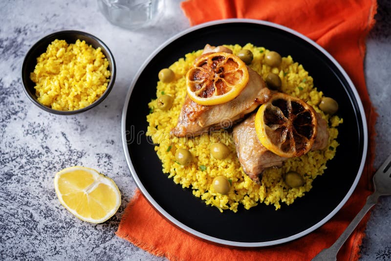 Moroccan Fried Chicken Breast with Curry Rice in a Plate Stock Photo ...