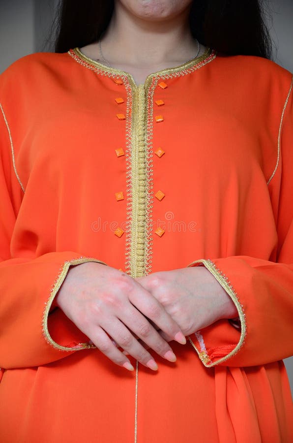 Moroccan Model Wearing an Orange Kaftan. Stock Photo - Image of arab ...
