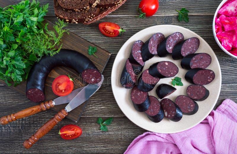 Morsilla - Blood Sausage. Pieces of Spanish Black Pudding on a Wooden ...