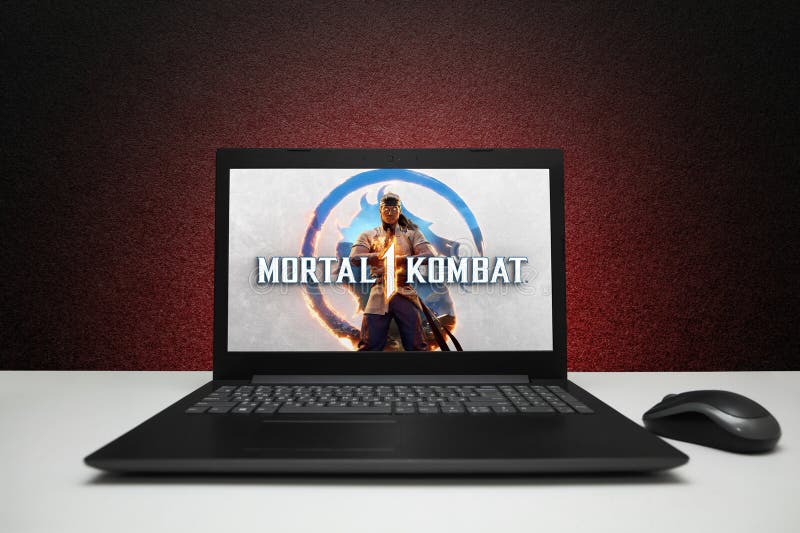 Mortal Kombat 1 Game on the Screen Laptop Computer with Mouse on Black ...
