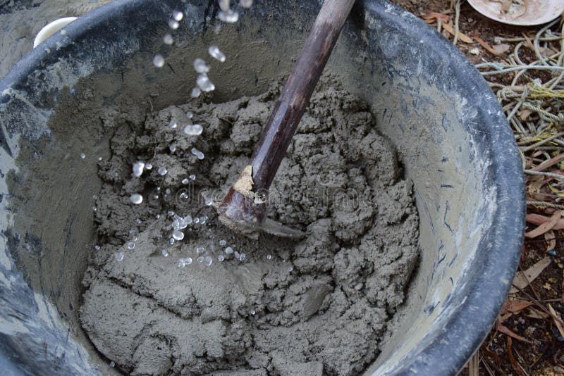 Mortar mix by hand stock image. Image of build, work - 74868779