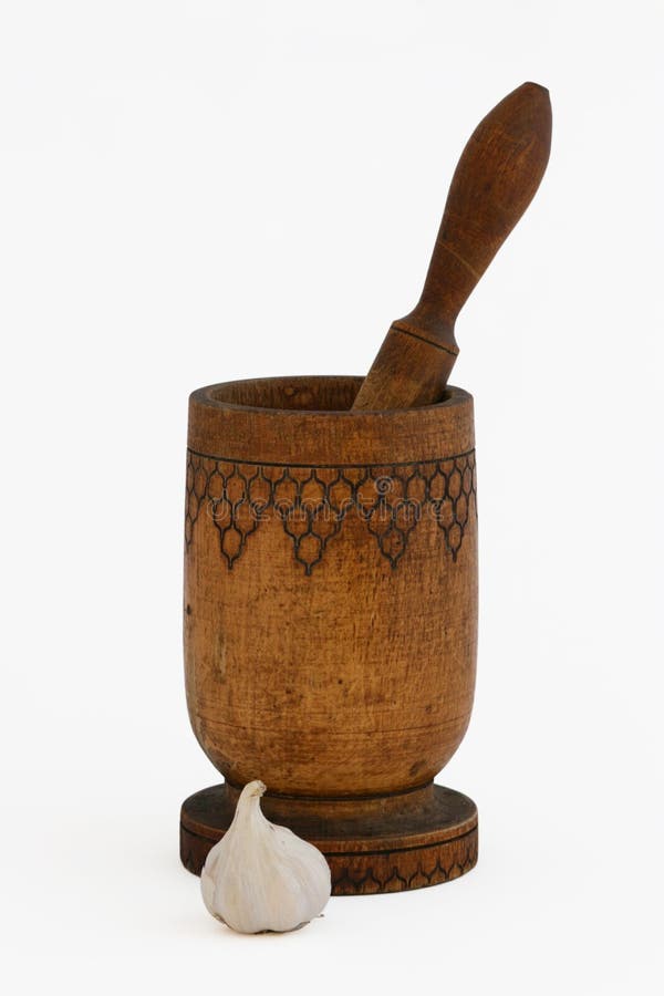 Mortar With Pestle And A Bulb Of Garlic Picture. Image: 7730506