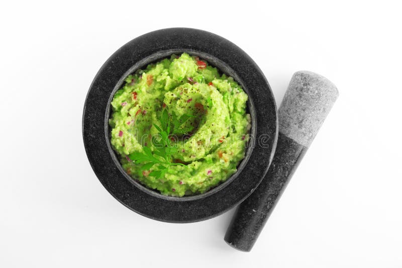 Mortar and Pestle with Delicious Guacamole Isolated on White, Top View ...