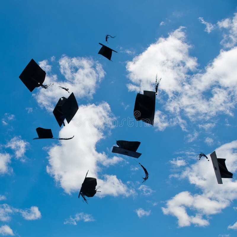 Graduation caps in flight stock photo. Image of horizontal - 8286044