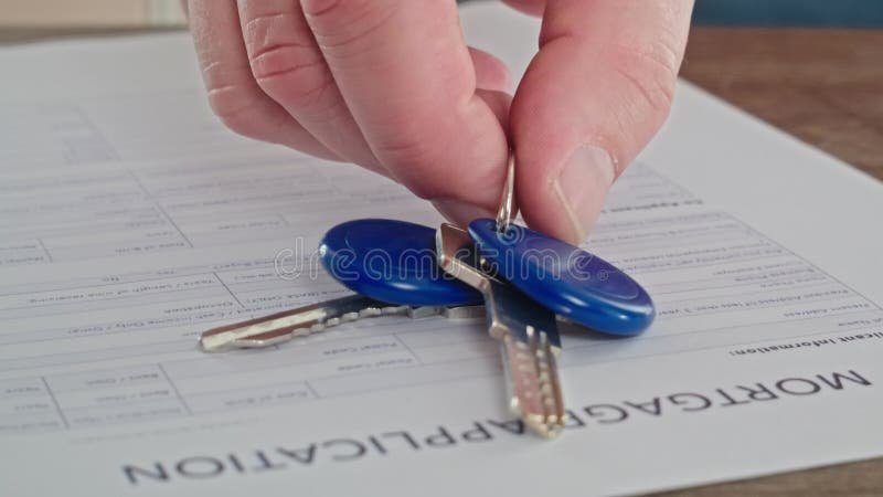 Mortgage Application Form with Keys from Home, Hand Taking Keys. Stock ...