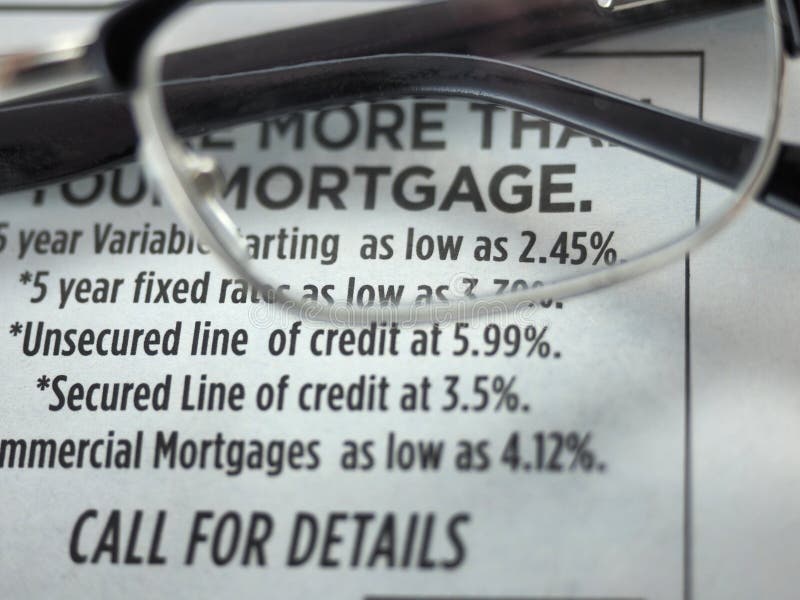 Mortgage Rates Ad in a Newspaper Stock Image - Image of paper, glasses ...