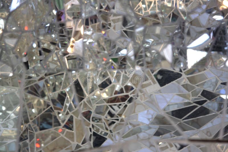 A Mosaic Background Made of Irregularly Shaped Mirrors, Reflecting ...