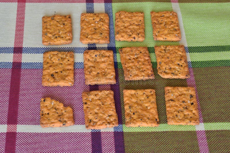 Mosaic of Crackers Laid Out on a Tablecloth. Stock Image - Image of ...