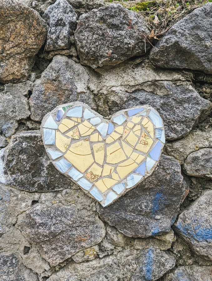 Mosaic Heart Shape Made of Tiles on Natural Stone Wall Stock Image ...