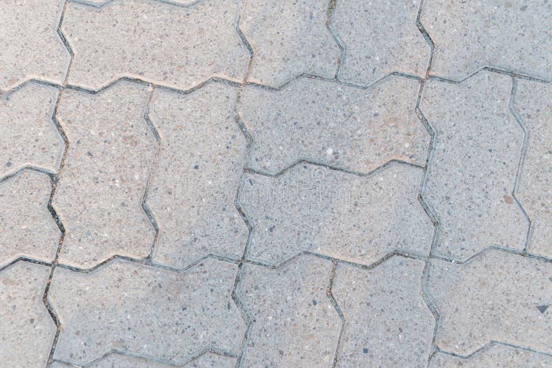 Mosaic Pattern of Interlocking Concrete Pavers in Soft Natural Light ...