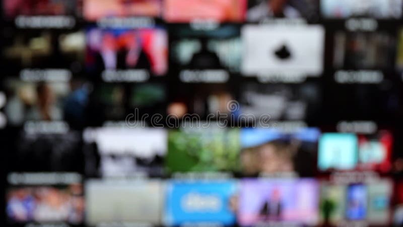 Watching multiple channels stock footage. Video of movie - 108181098