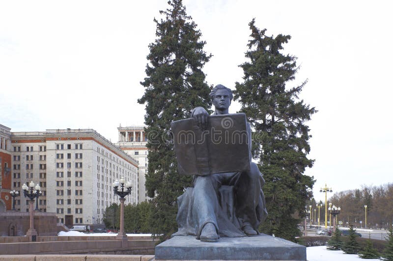 Statue of a Student Reading the Book at Moscow State University. Cloudy ...