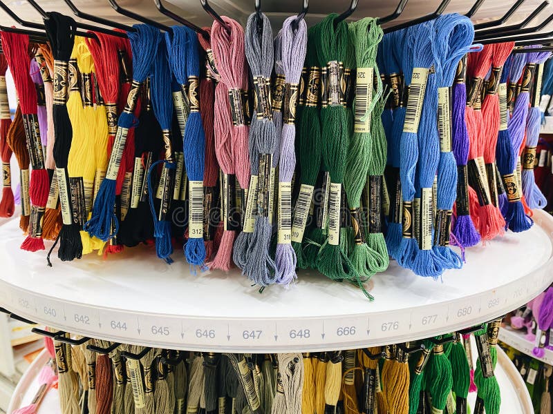 Multi-colored Threads for Embroidery Dms on the Stand in the Store, the ...
