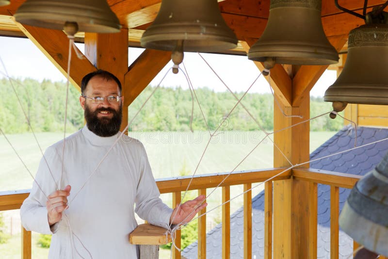Moscow, Russia August 2018, the Bell Ringer is Ringing Bells Editorial ...