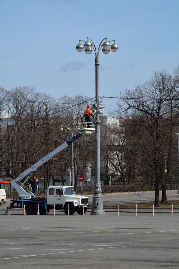 MOSCOW/RUSSIAN FEDERATION - APRIL 13 2015: Man is Installing the ...